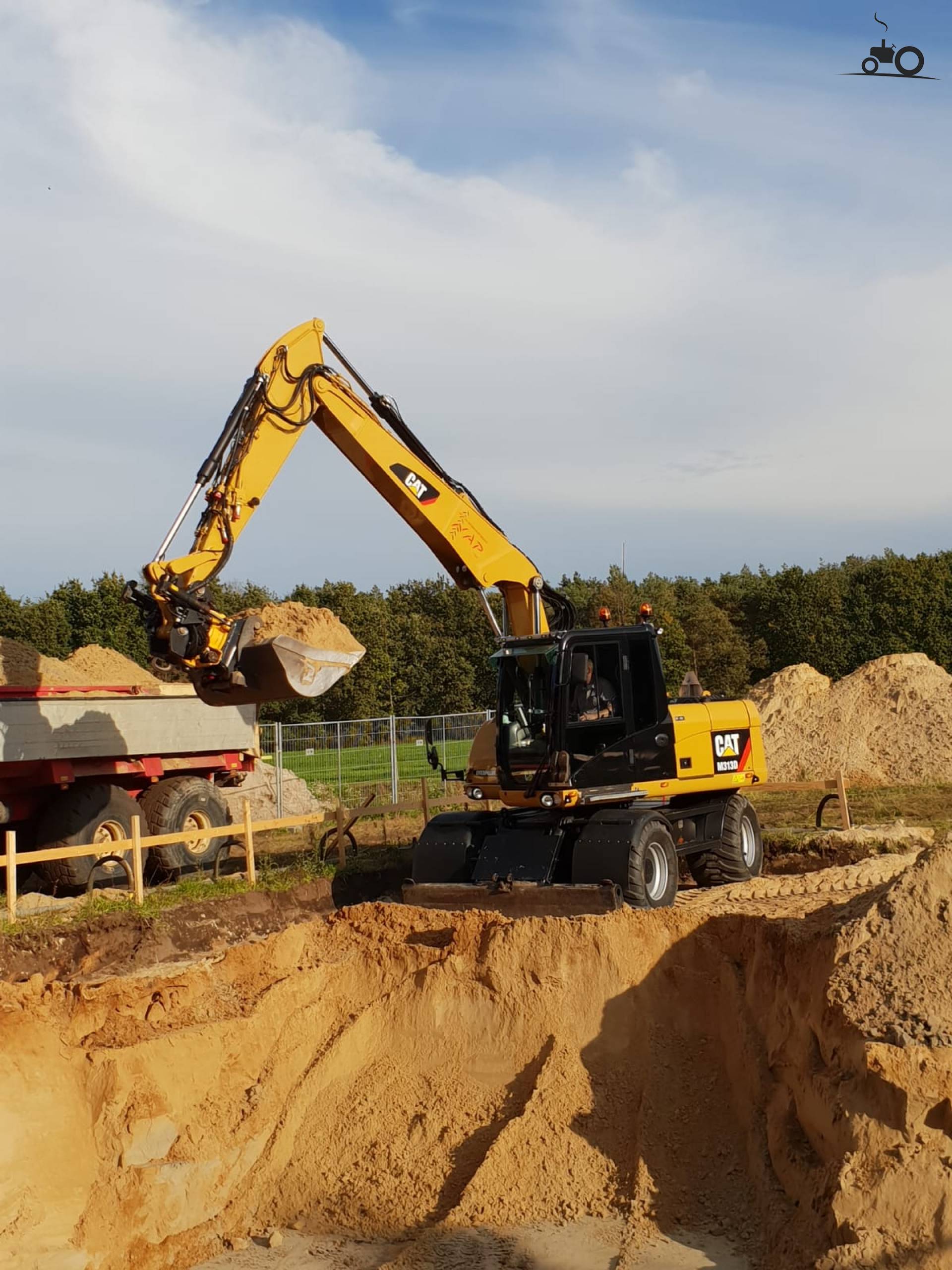 Foto Cat M313D #1255911