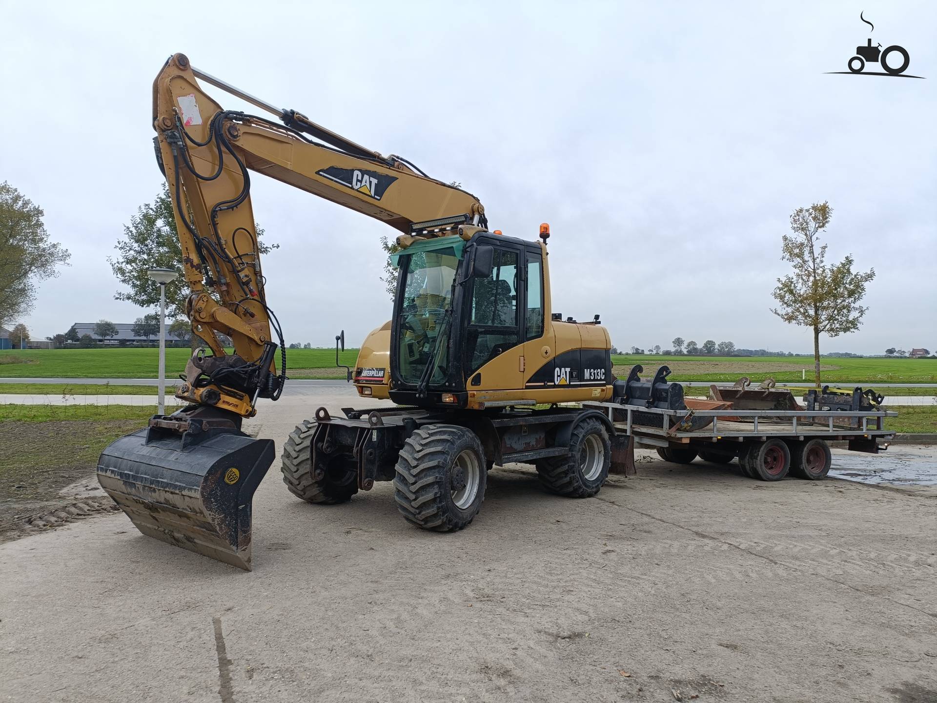 Foto Cat M313C #1590936