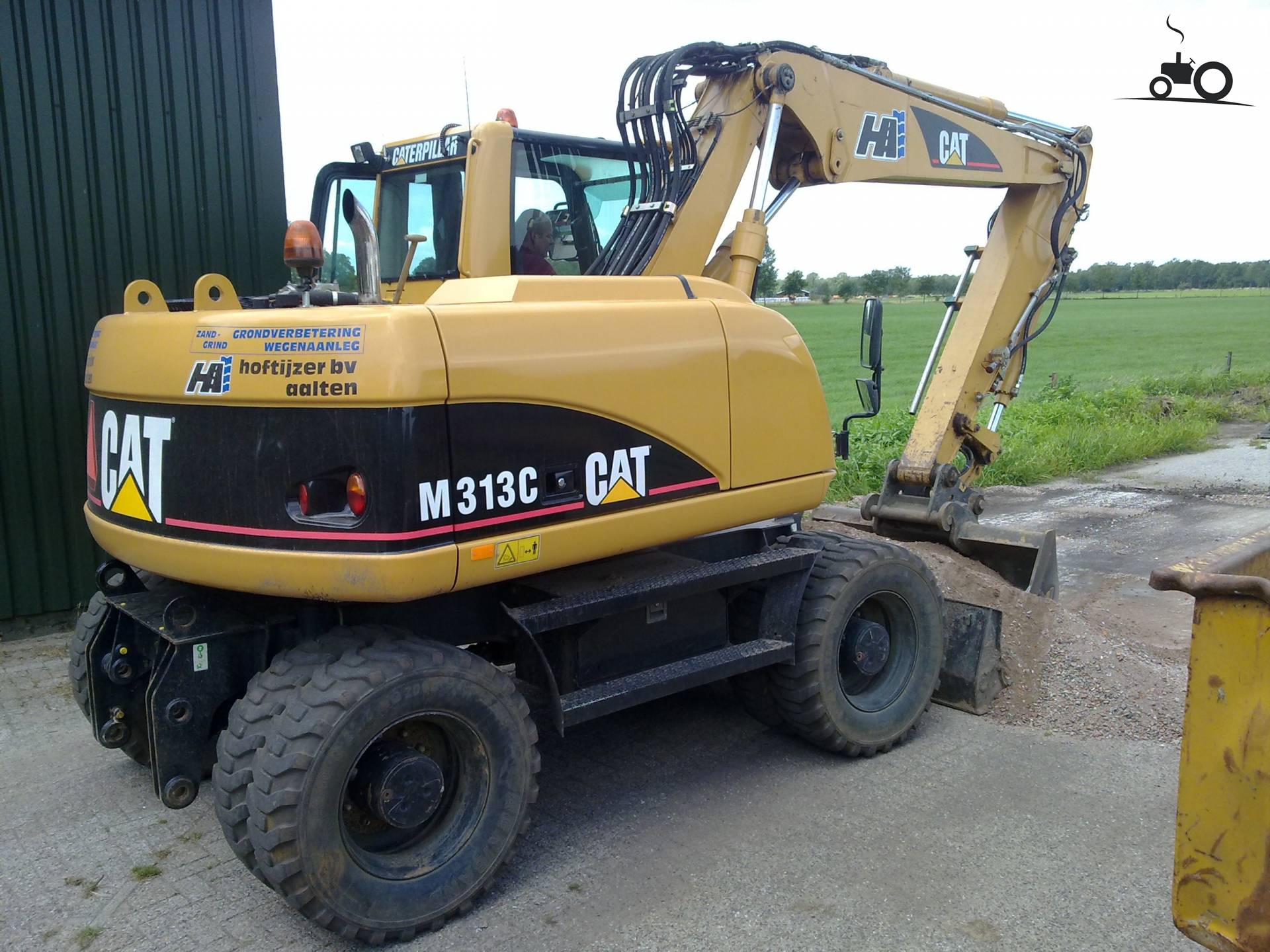 Foto Cat M313C #510288