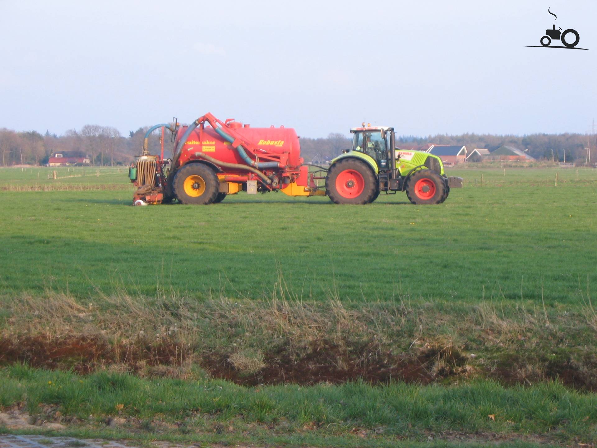 Foto Claas Axion 840 van Unicom Oost BV