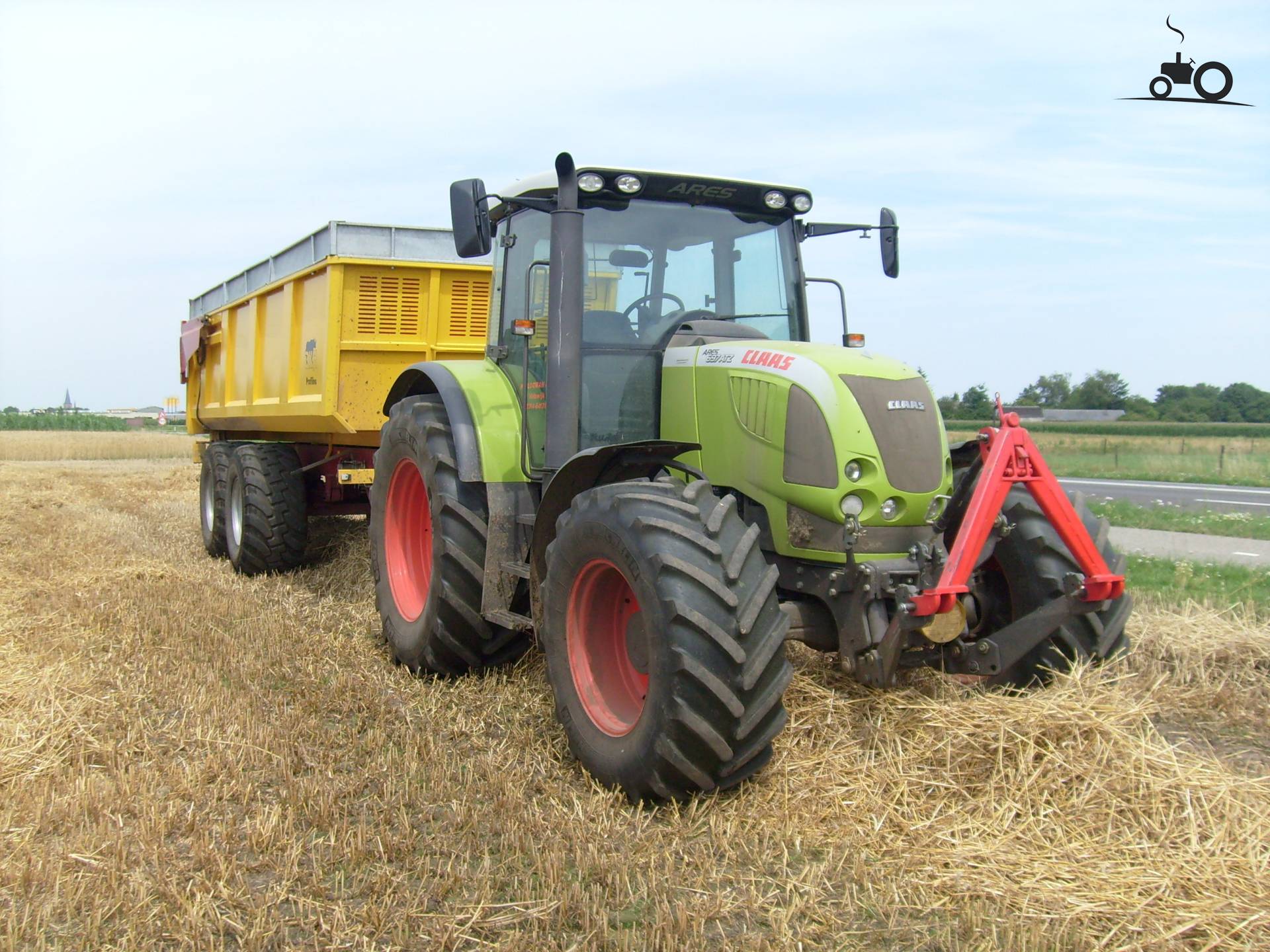 Foto Claas Ares 697 ATZ van H.j. Looman en Zn.