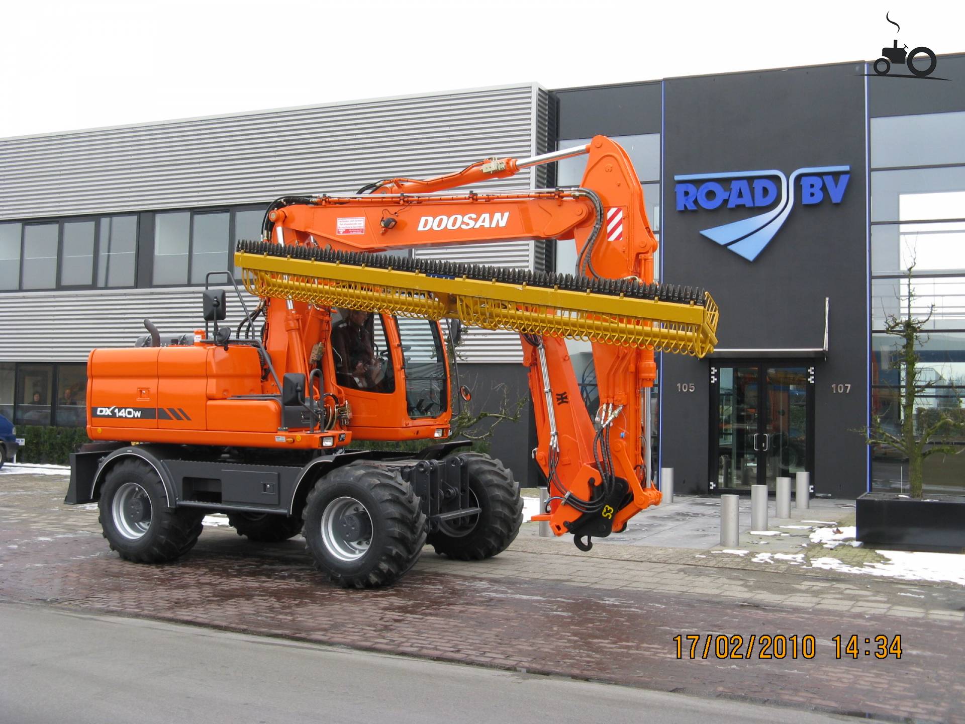 Foto Doosan DX140W #366700