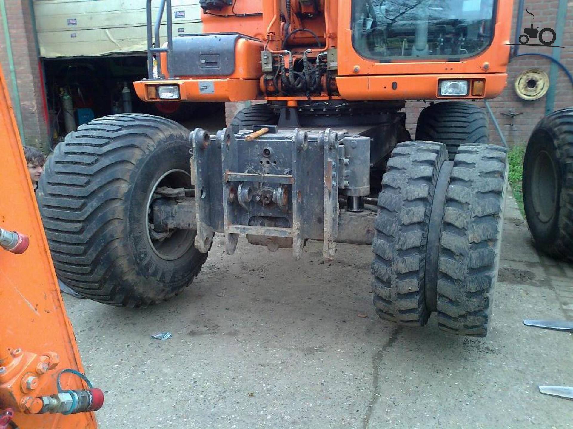 Foto Doosan DX140W #565605