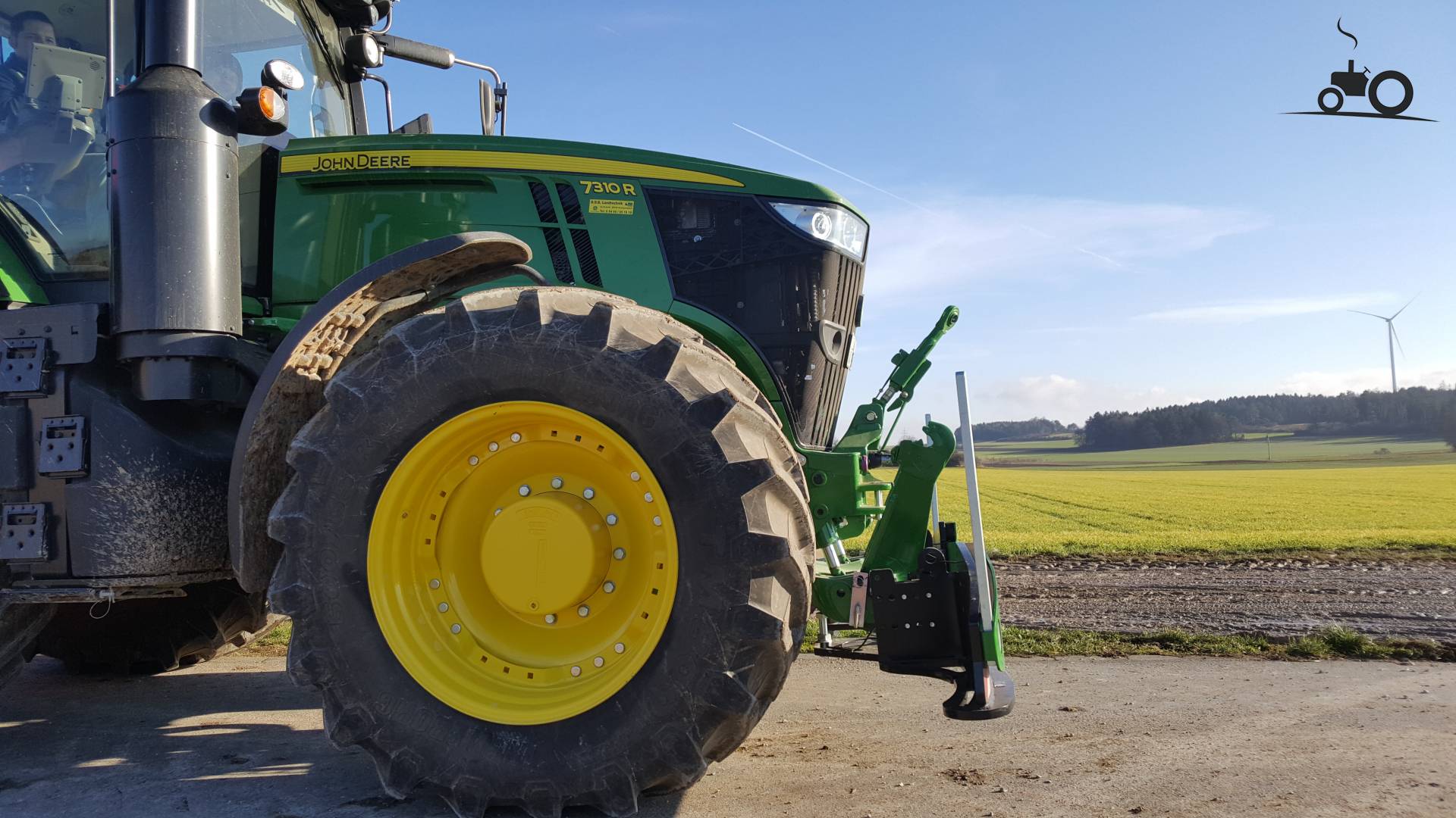 Foto John Deere 7310R #1141738