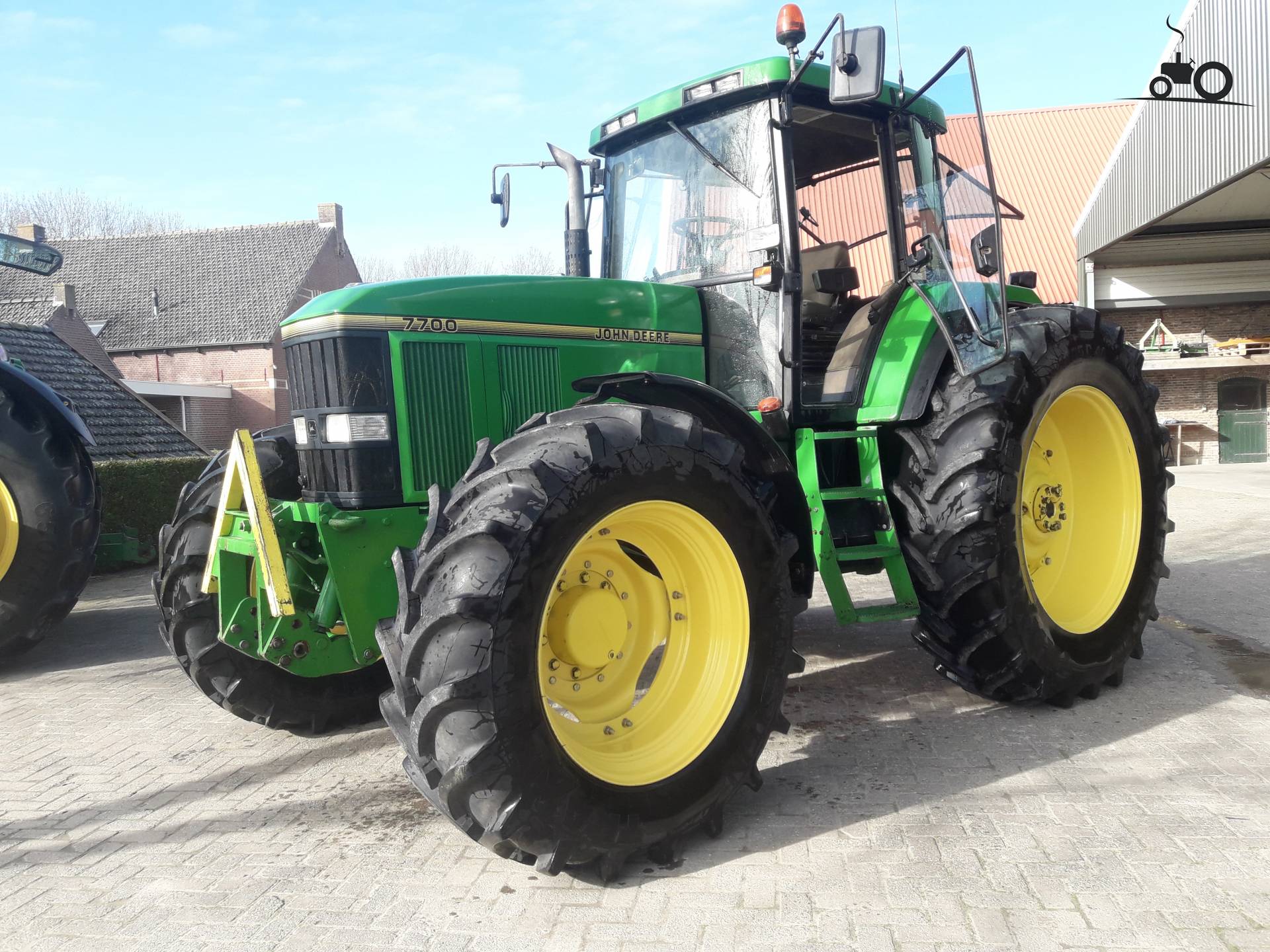 Foto John Deere 7700 #1457870