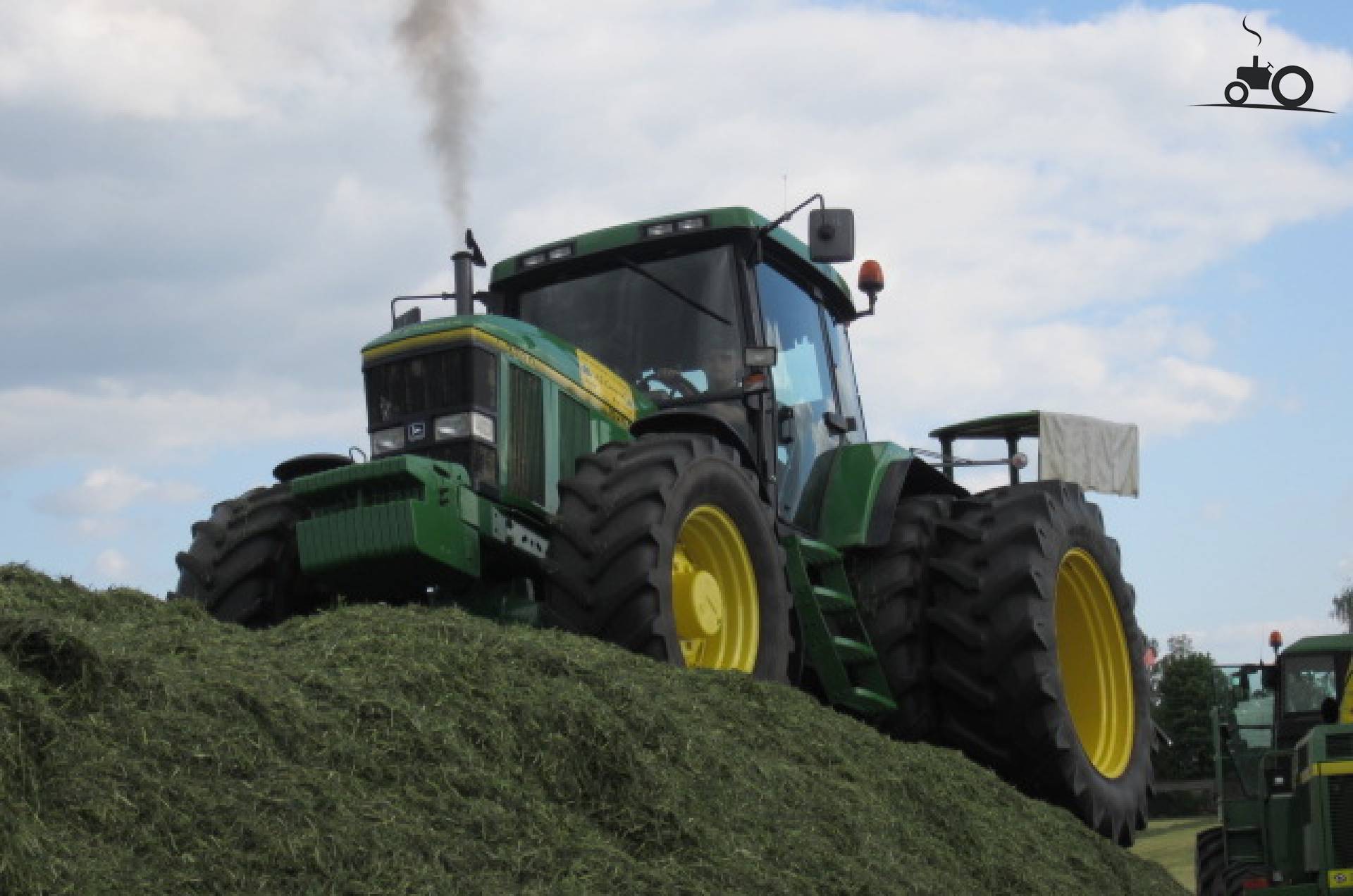 Foto John Deere 7700 van A.j. Looman & Zn.