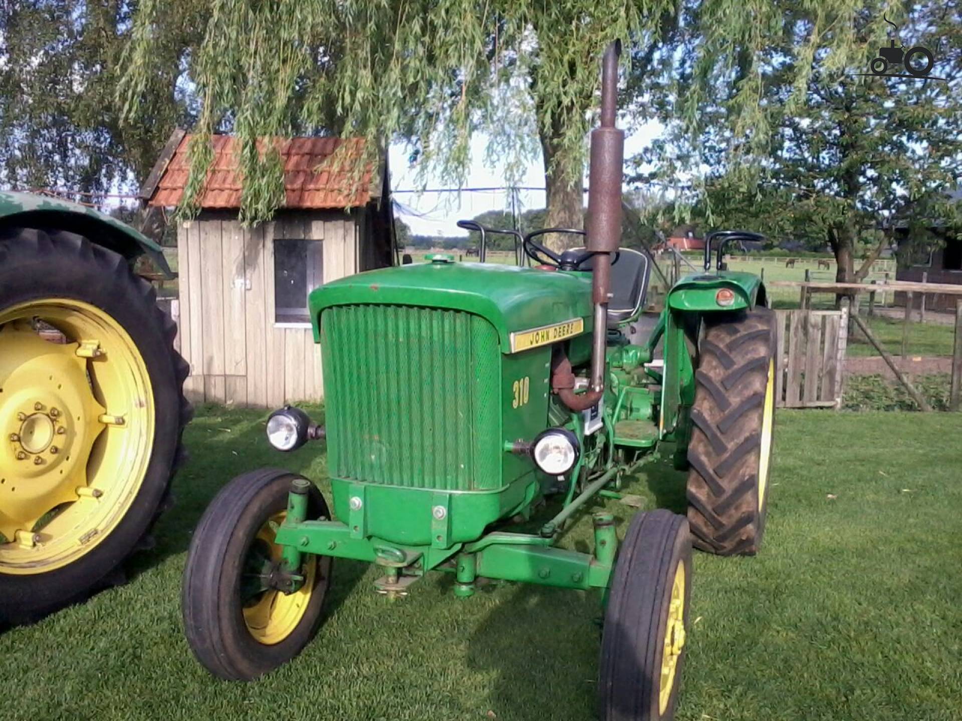 Foto John Deere 310 #906897