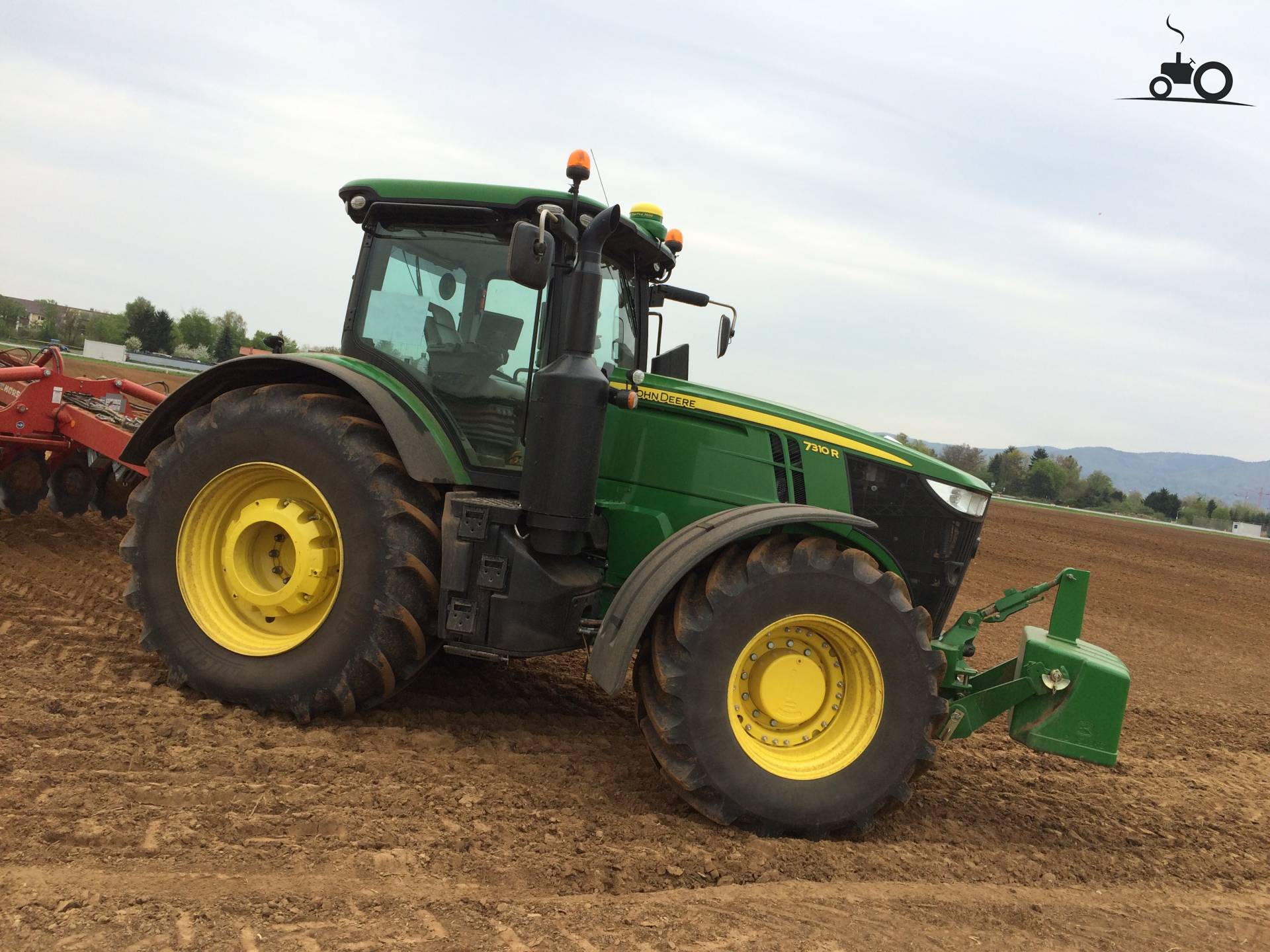 Foto John Deere 7310R #910577