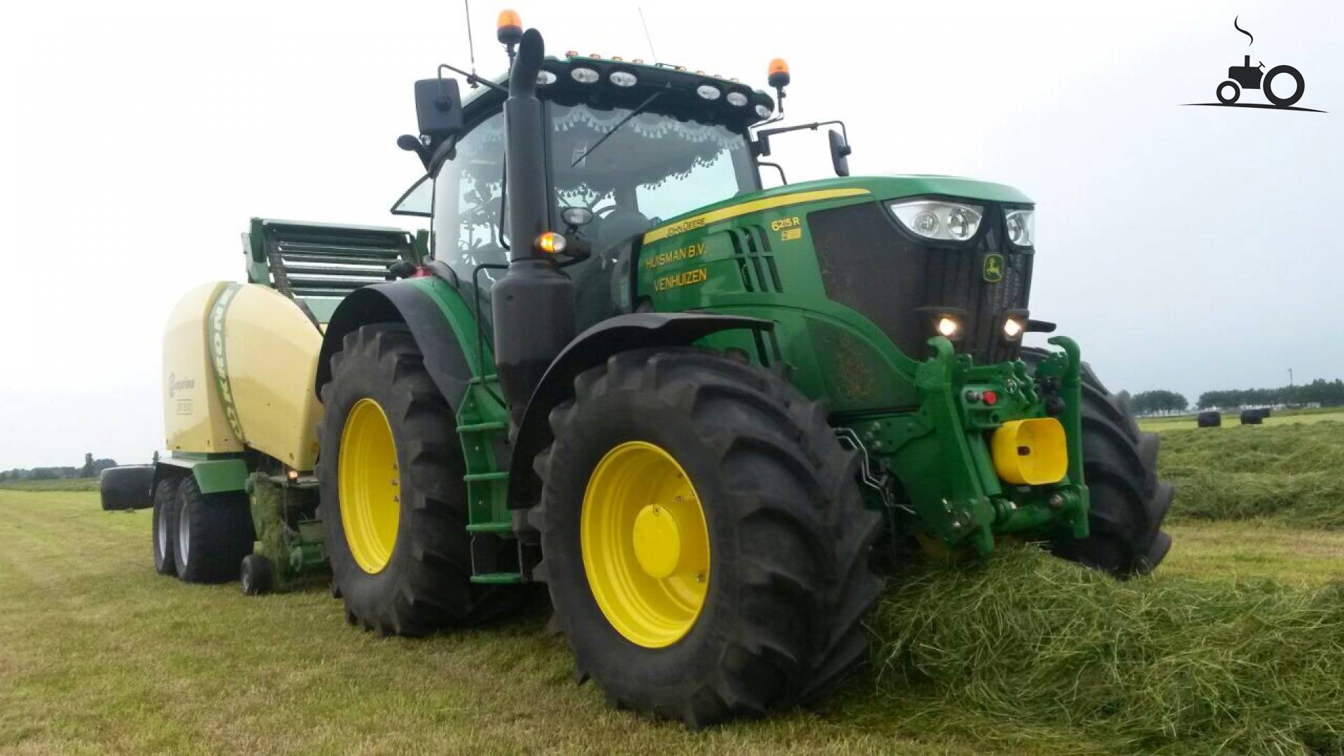 Foto John Deere 6215R van Huisman BV