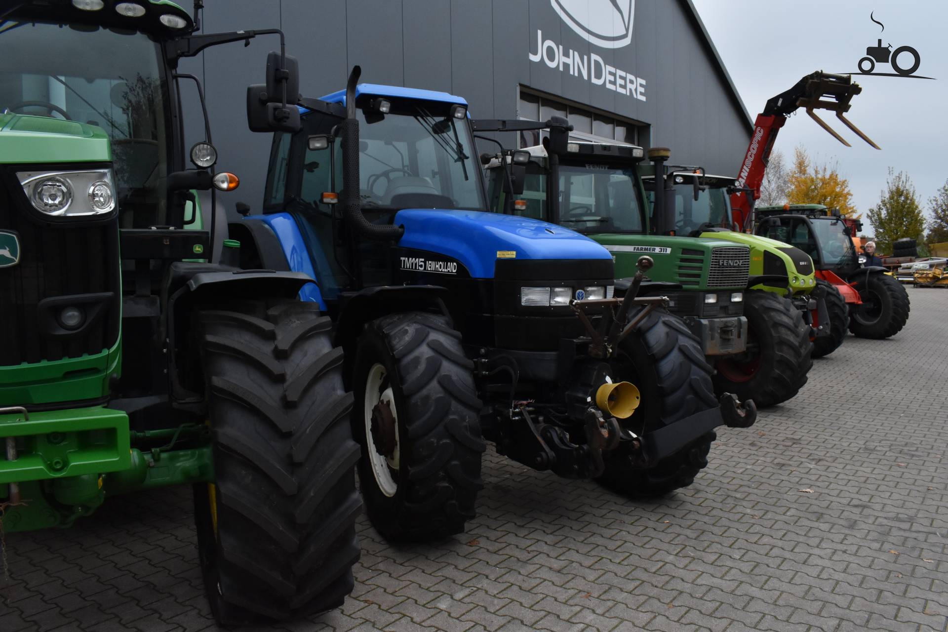Foto New Holland TM 115 #1601170
