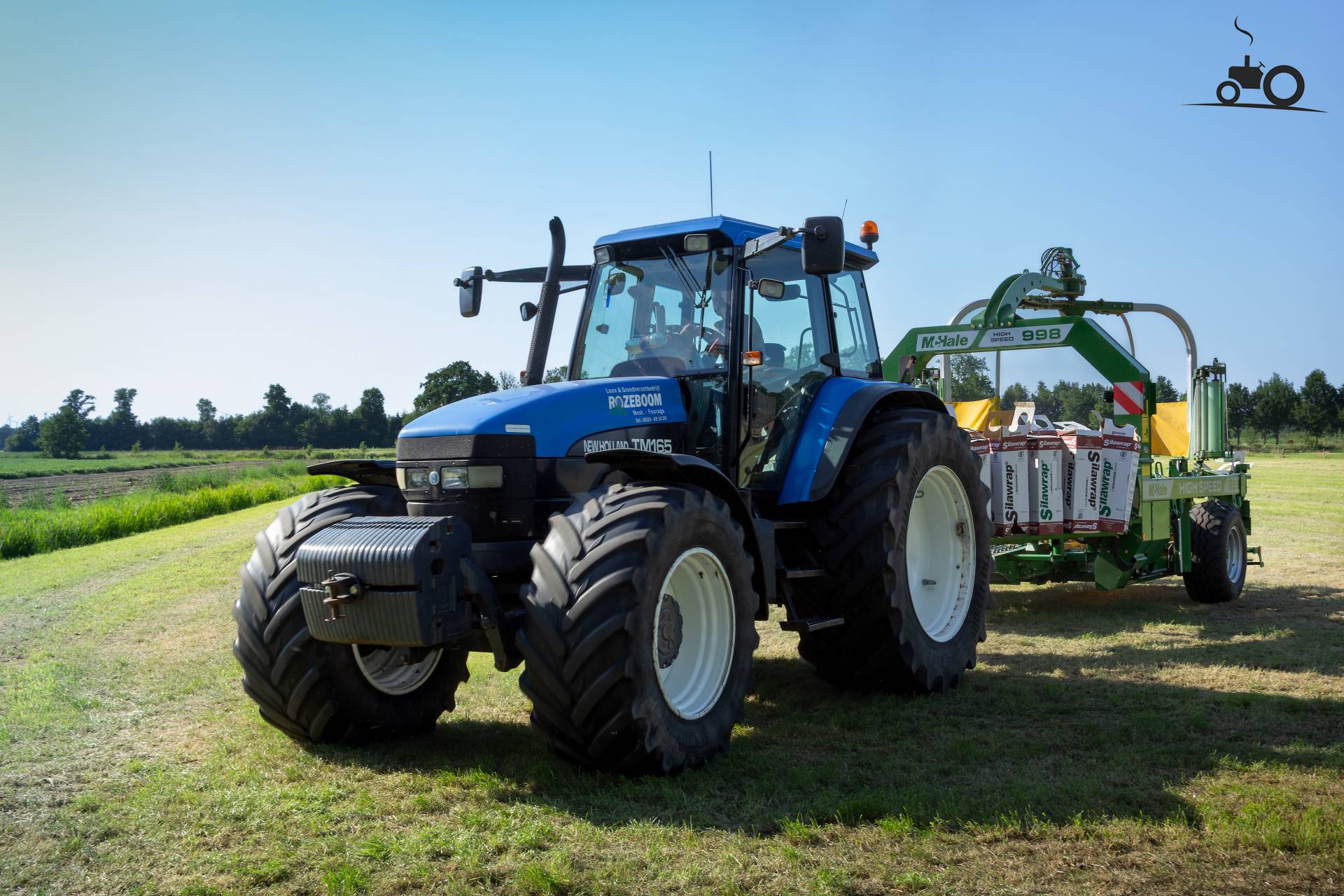 Foto New Holland TM 165 #1626696