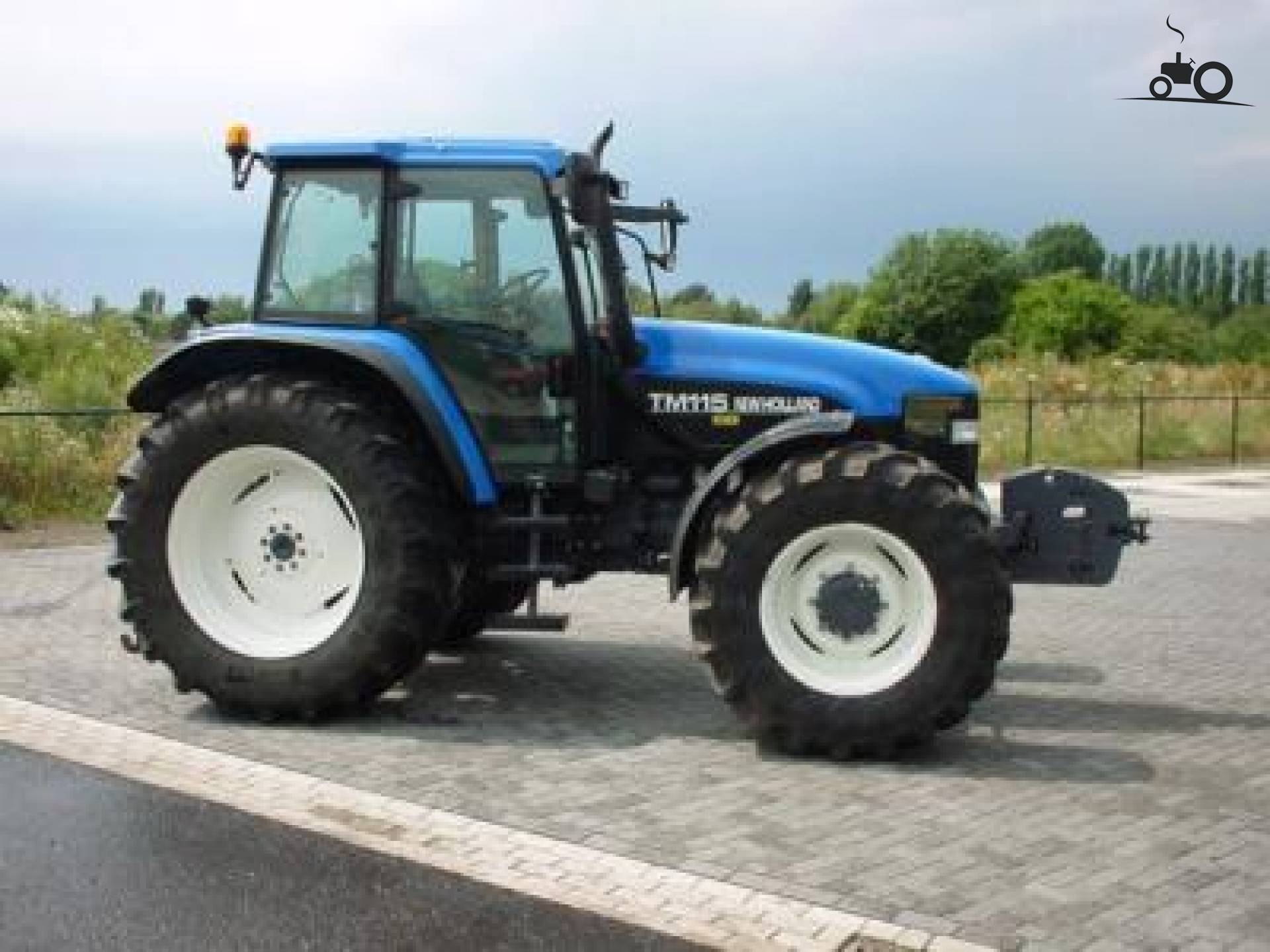 Foto New Holland TM 115 #3826