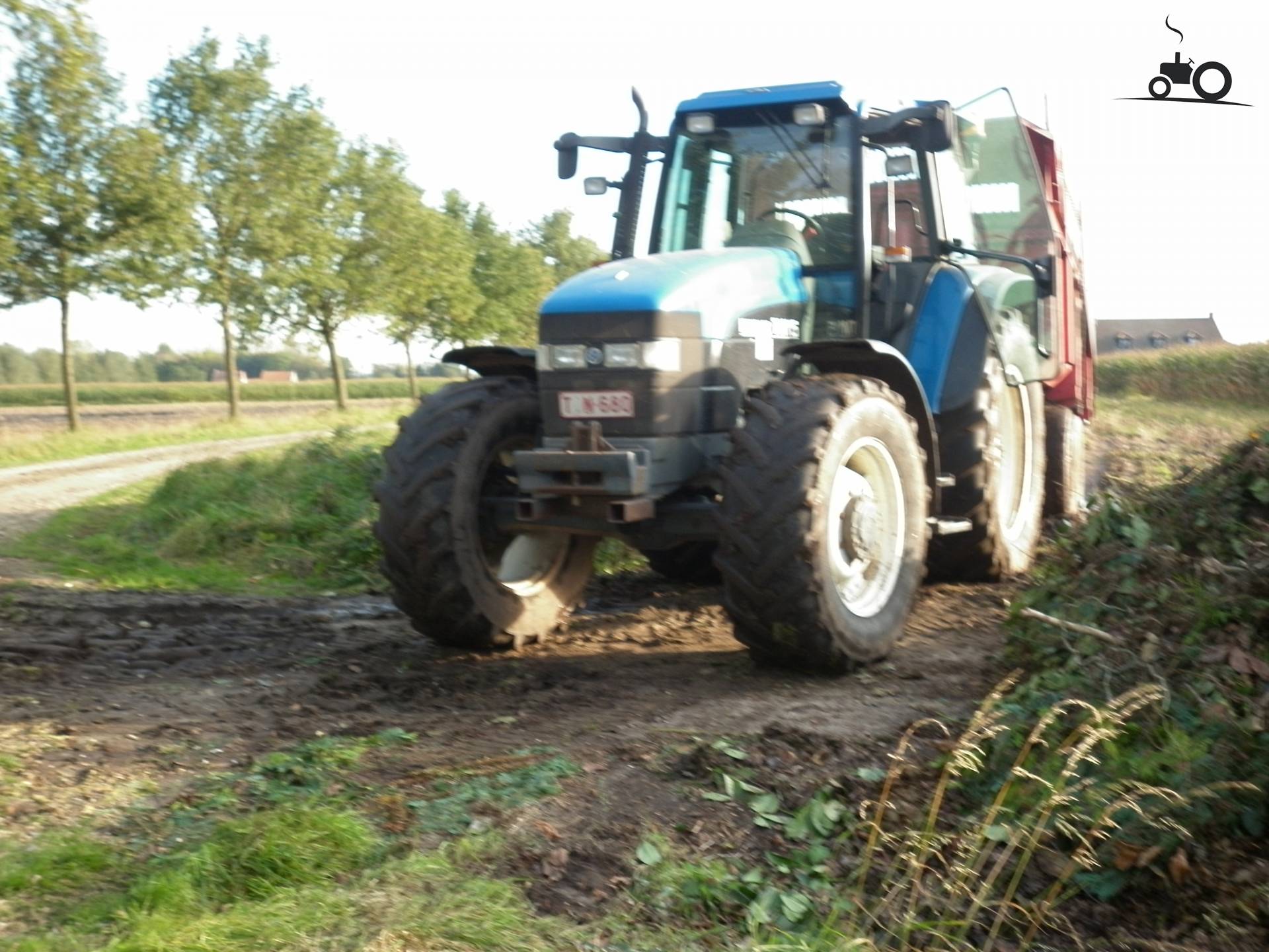 Foto New Holland TM 115 #555258
