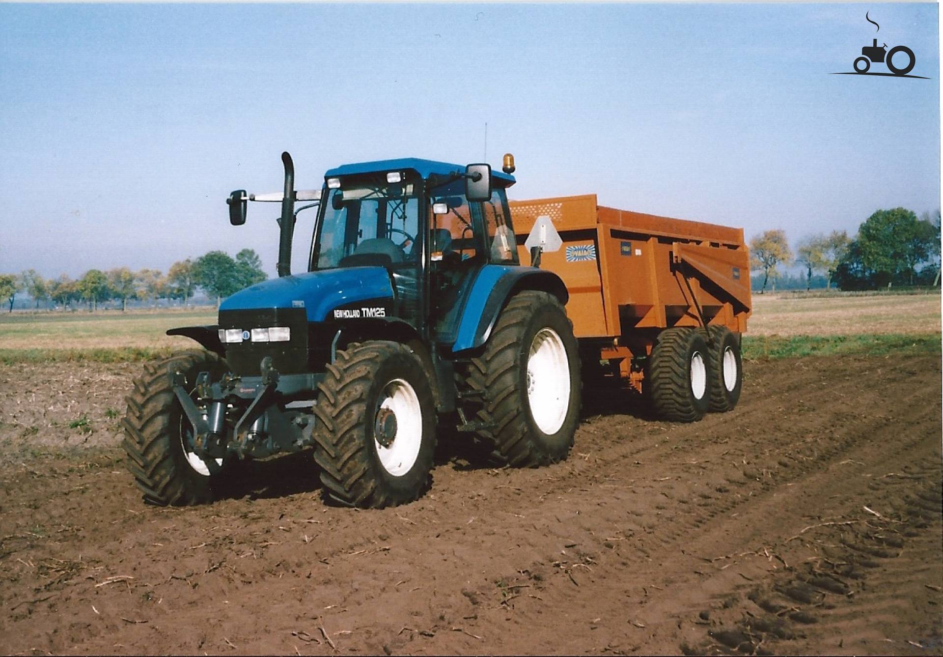 Foto New Holland TM 125 #600455