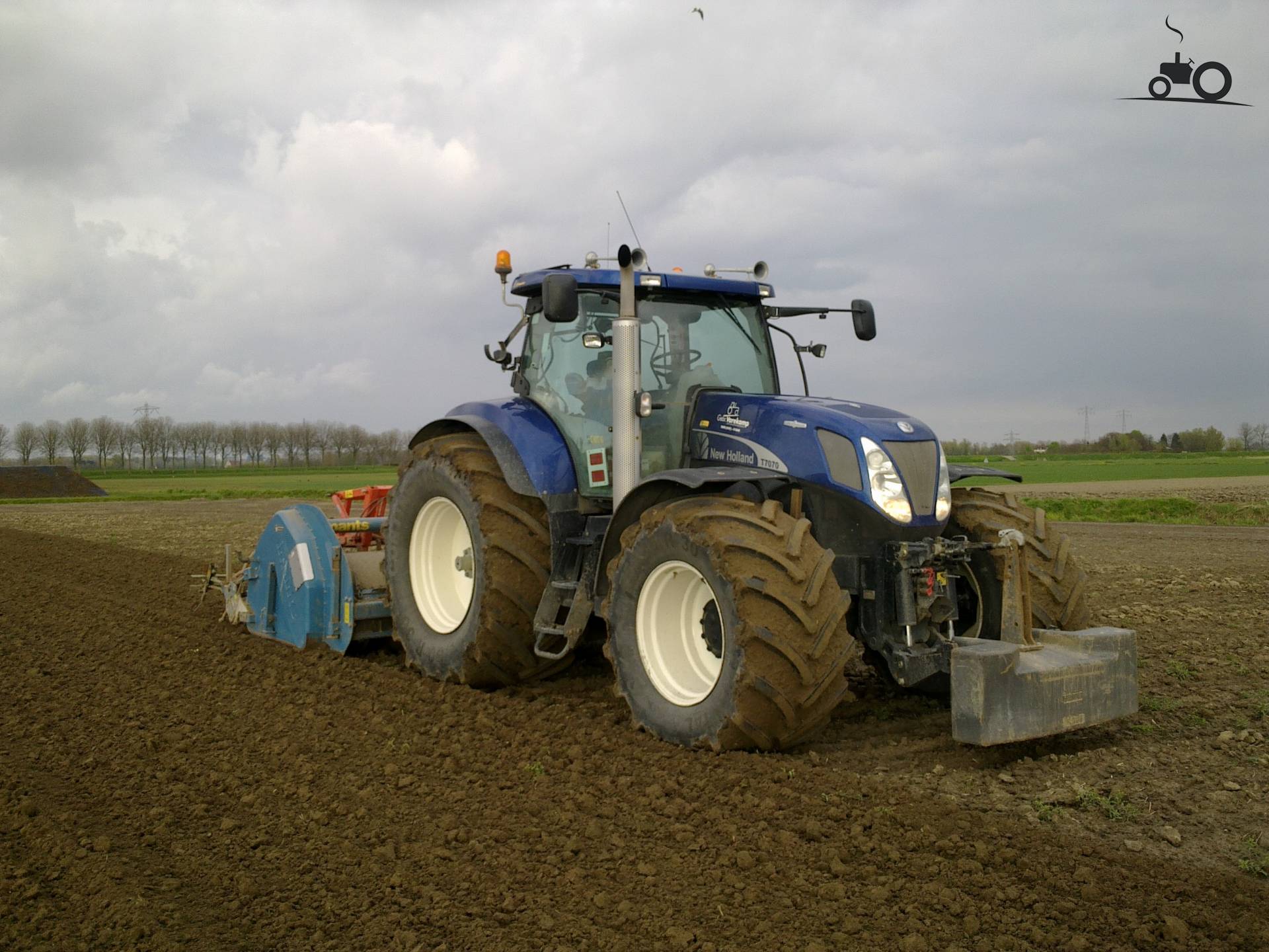 Foto New Holland T 7070 #712953