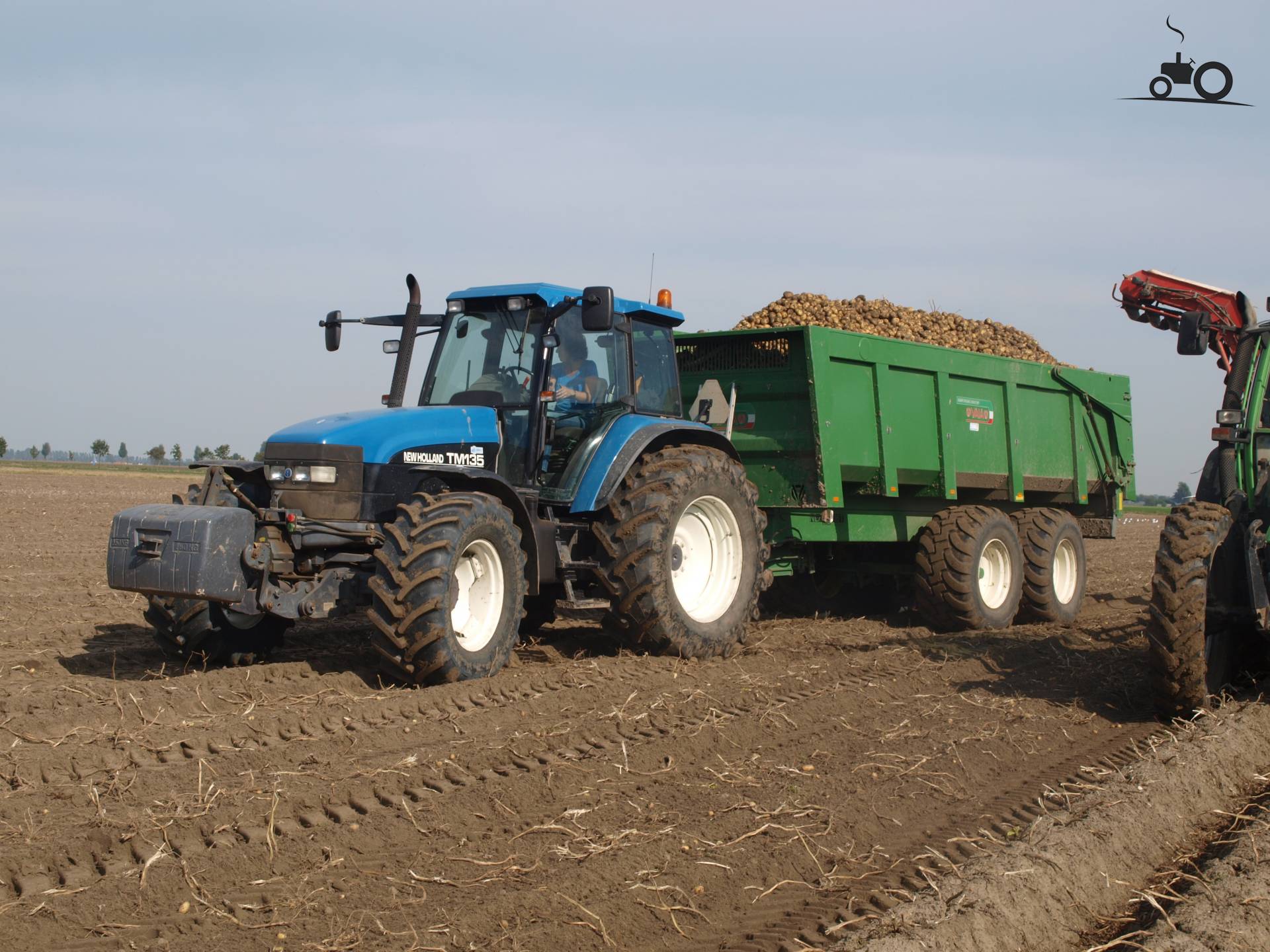 Foto New Holland TM 135 #796352