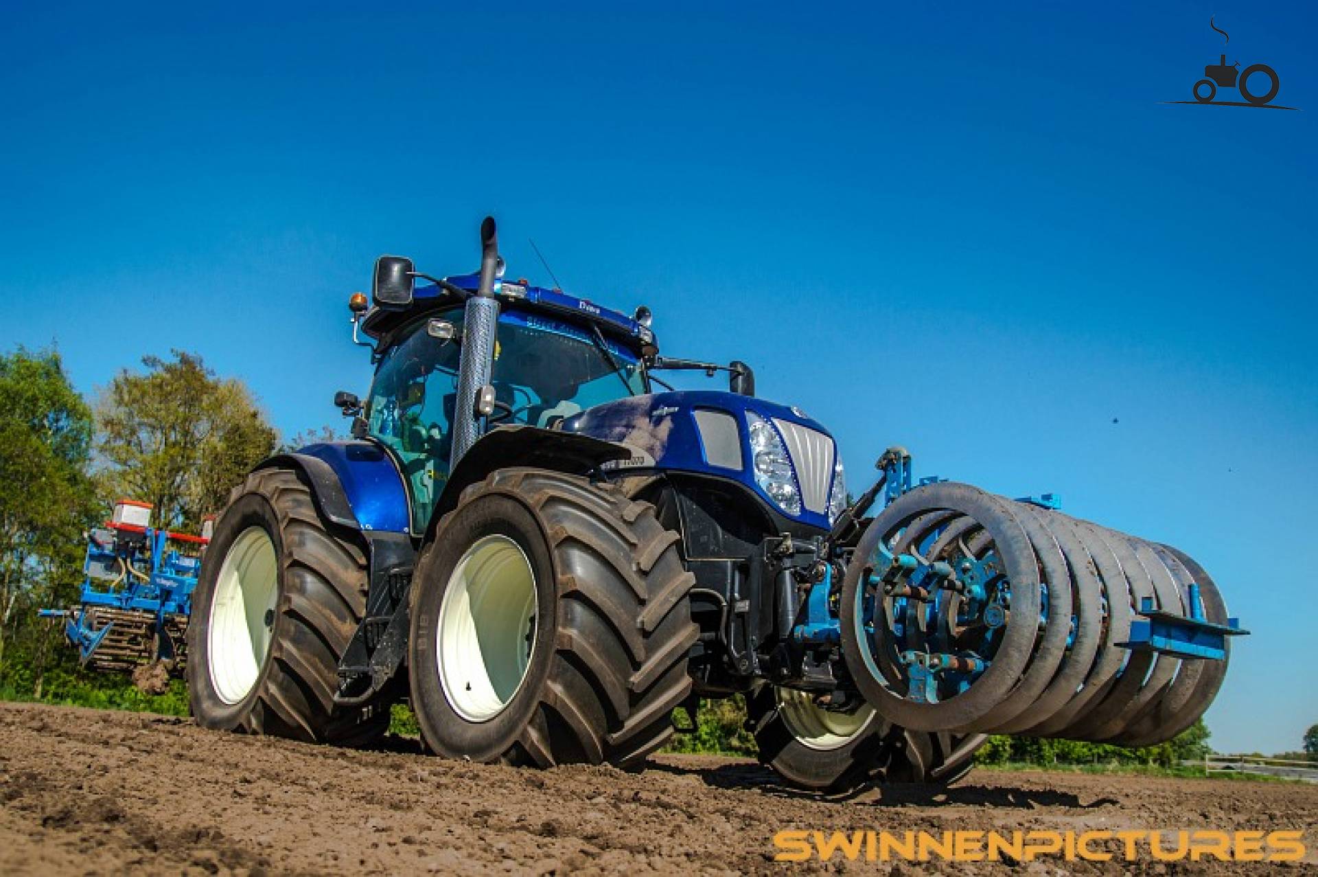 Foto New Holland T 7070 #850670