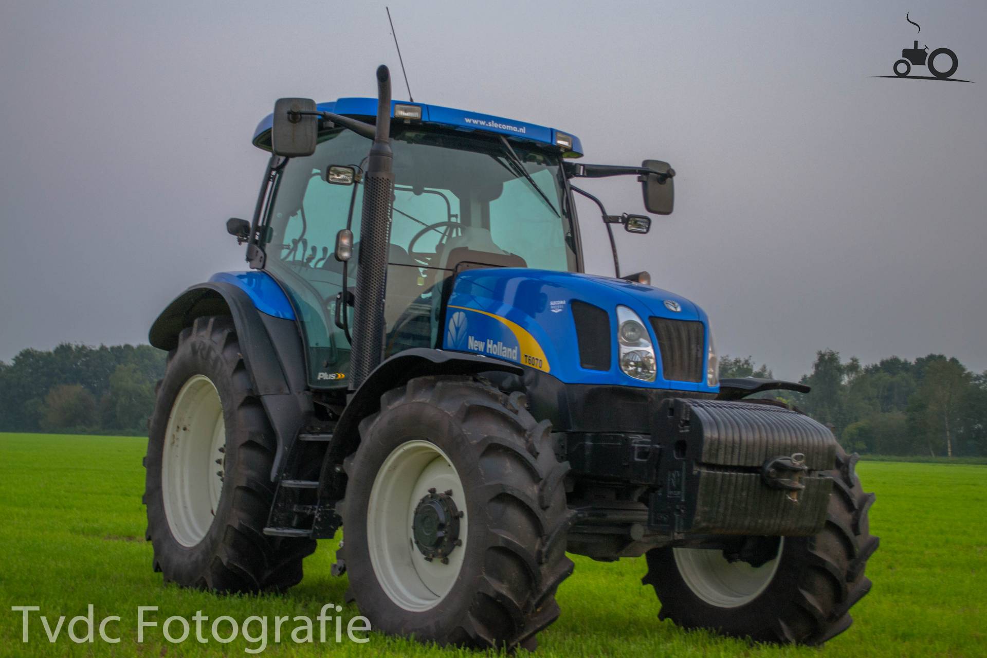 Foto New Holland T 6070 #871025