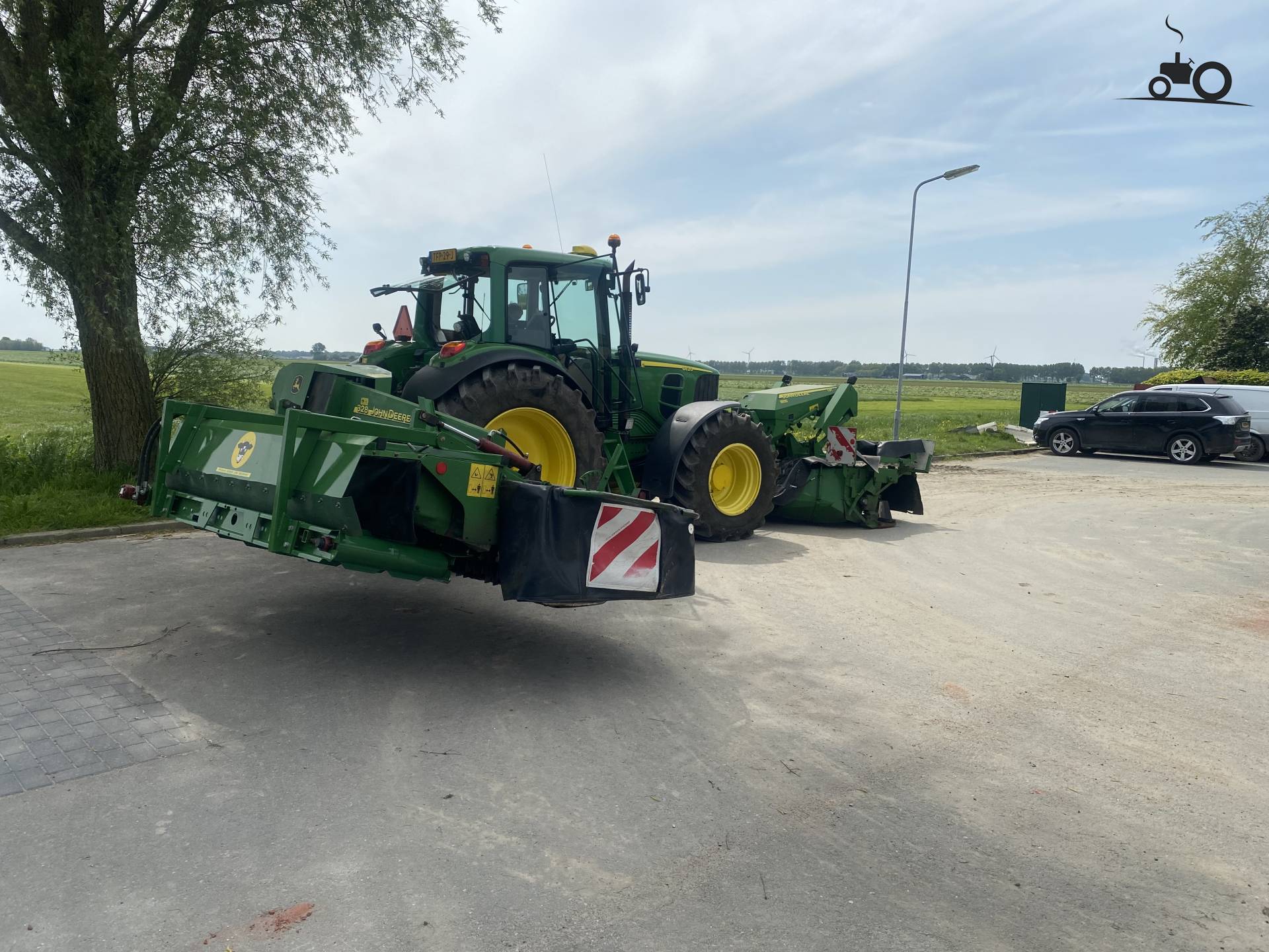 Maaier met afvoerbandje