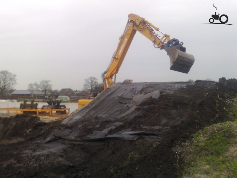 Foto Doosan DX140W #338597