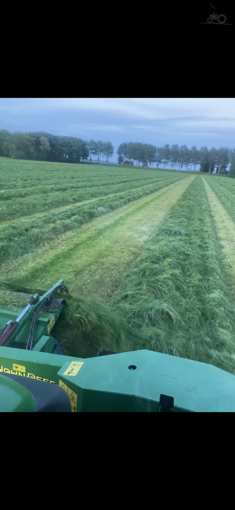 Maaier met afvoerbandje